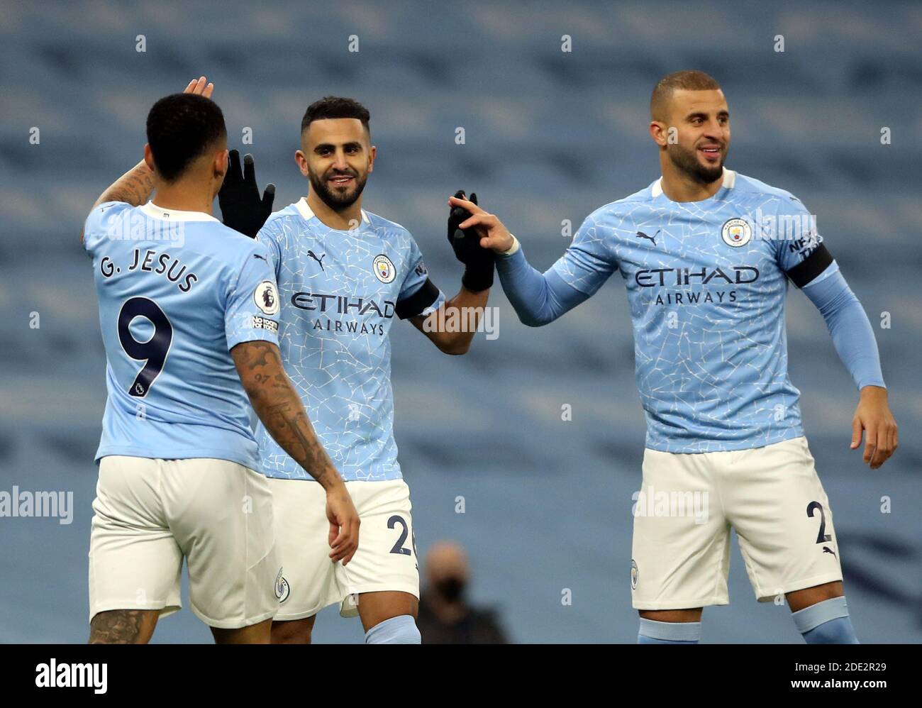 Manchester City's Riyad Mahrez celebrates scoring the opening goal ...