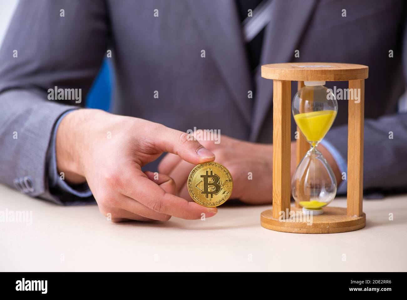Man earning money via Internet in time management concept Stock Photo ...