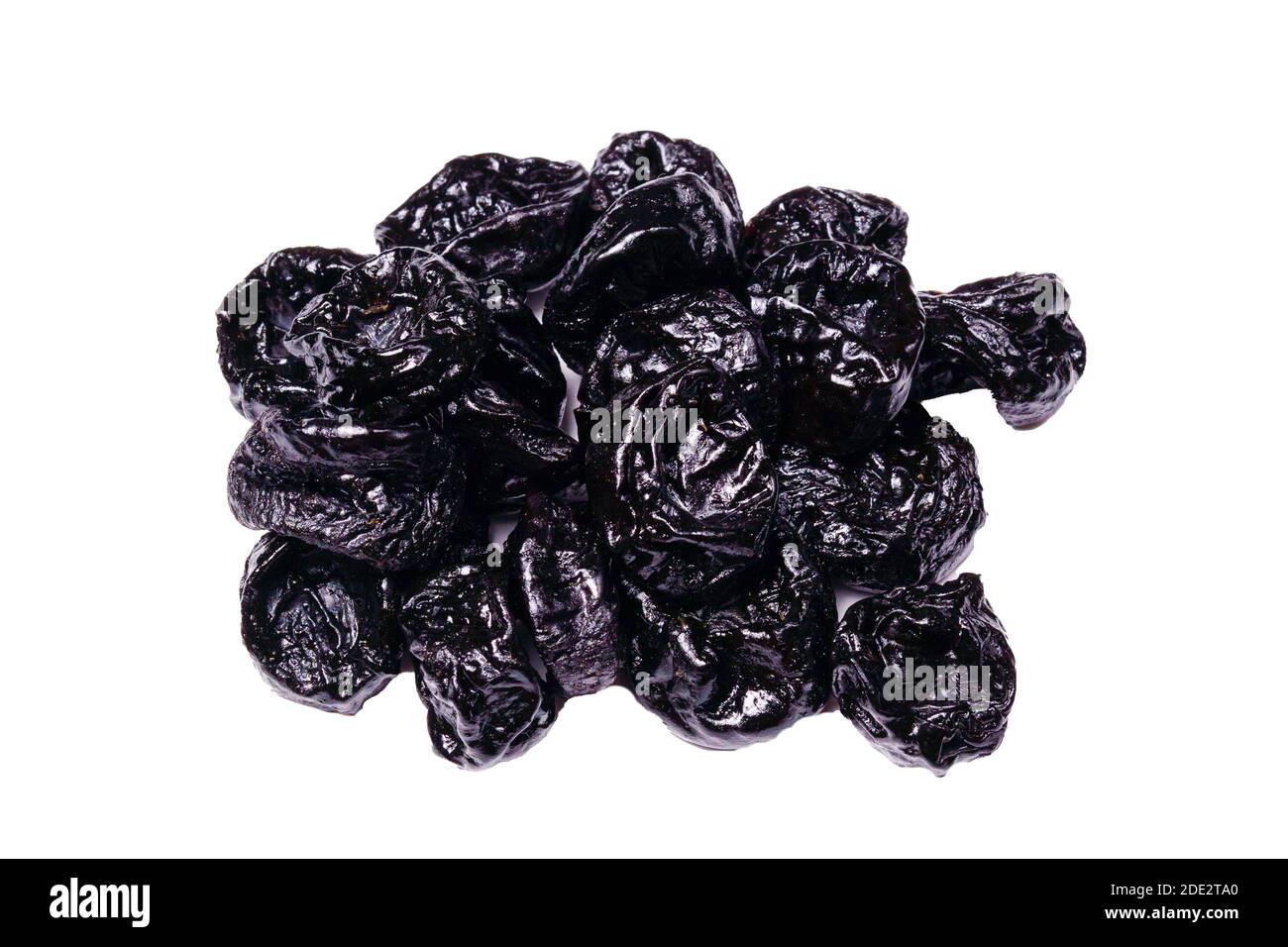 dried plums prunes close-up isolated on white background. healthy dried ...