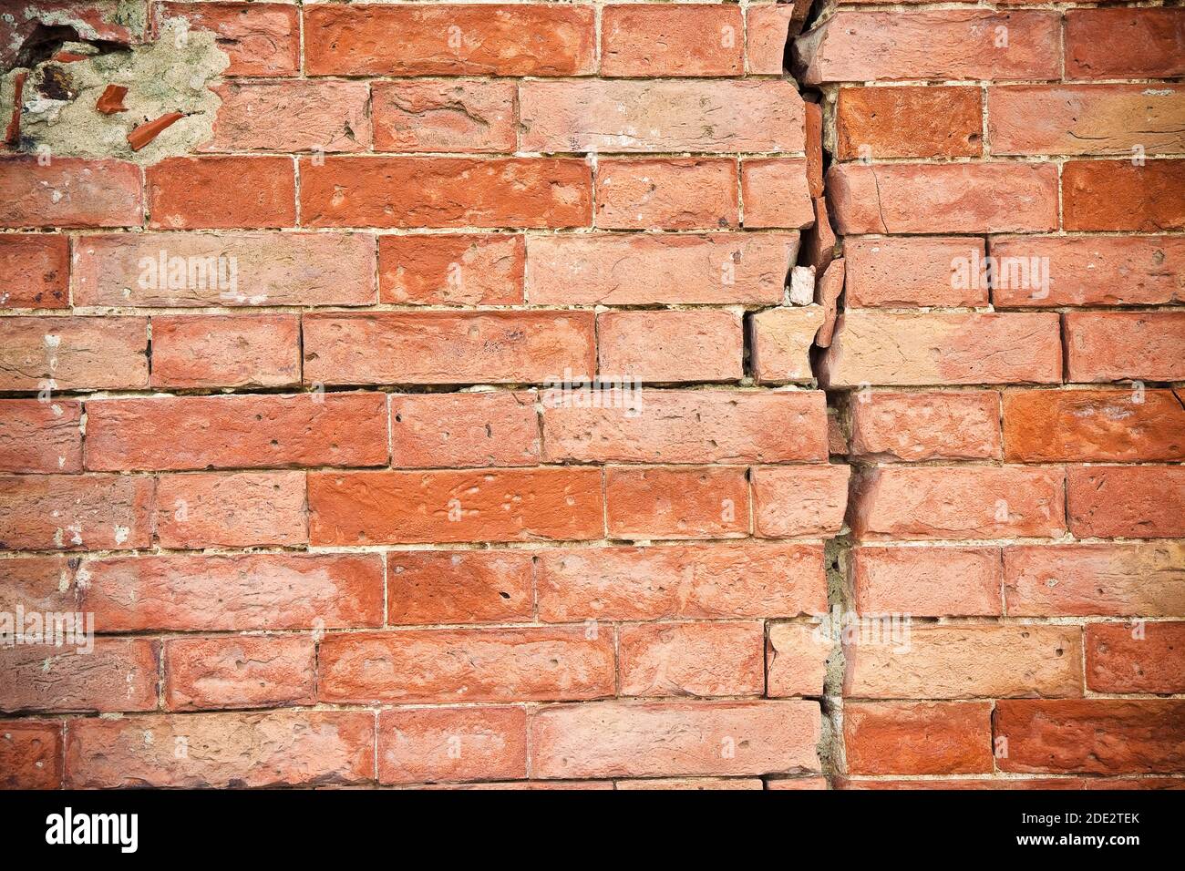 Deep crack in old brick wall - concept image Stock Photo - Alamy