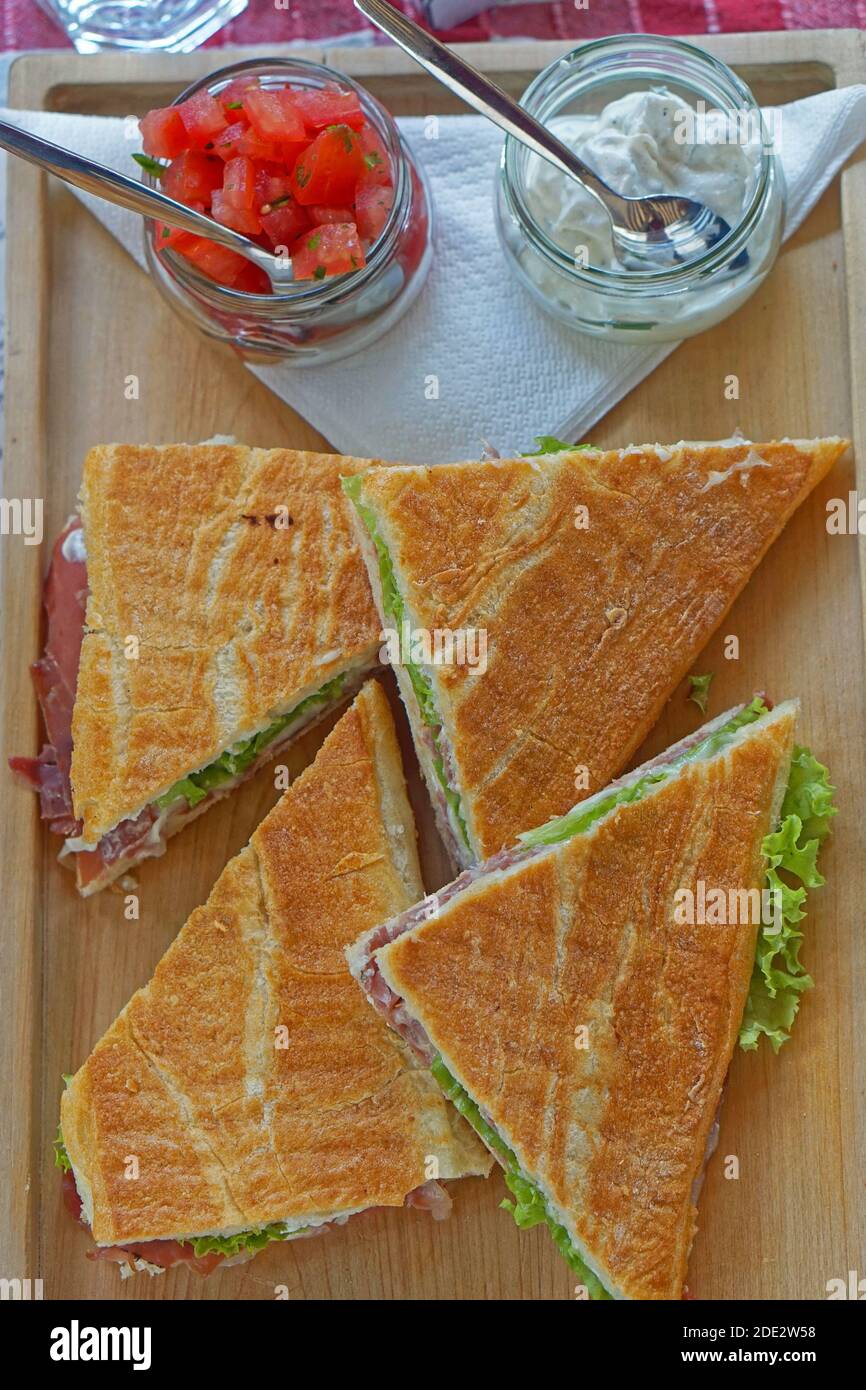 Triangular toast sandwiches diagonally cut Stock Photo - Alamy