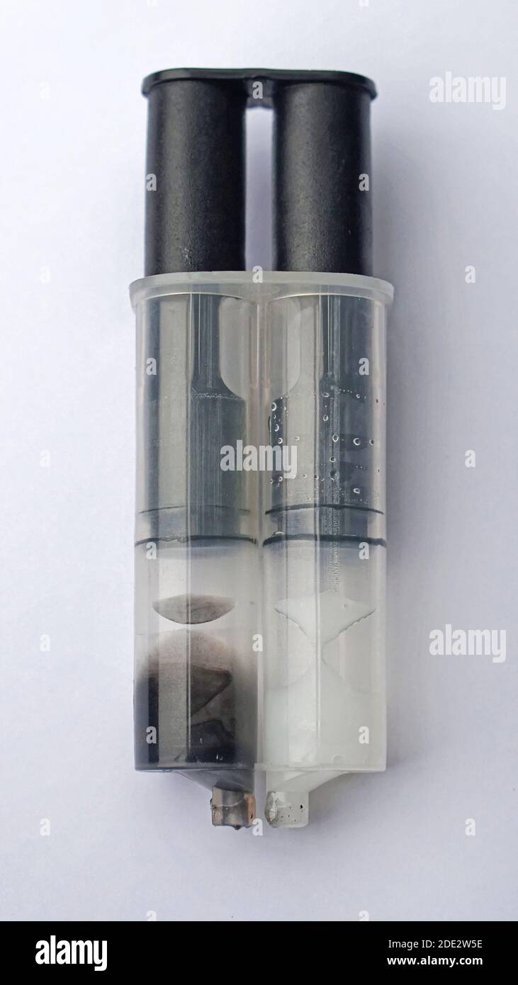 Two part epoxy adhesive glue in syringe Stock Photo - Alamy