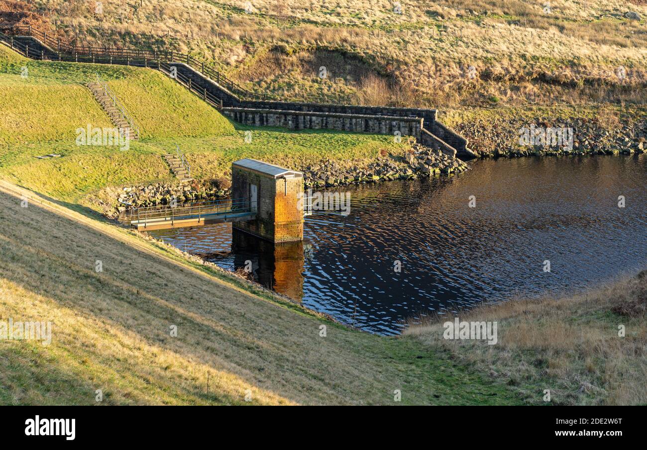 valve tower and slipway in evening sunlight, dove stone reservoir Stock ...