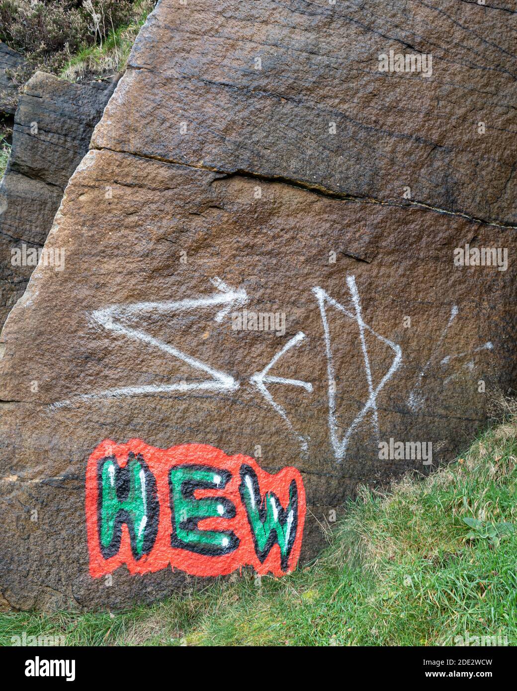 graffiti on a gritstone escarpment near holmfirth, west yorkshire Stock ...