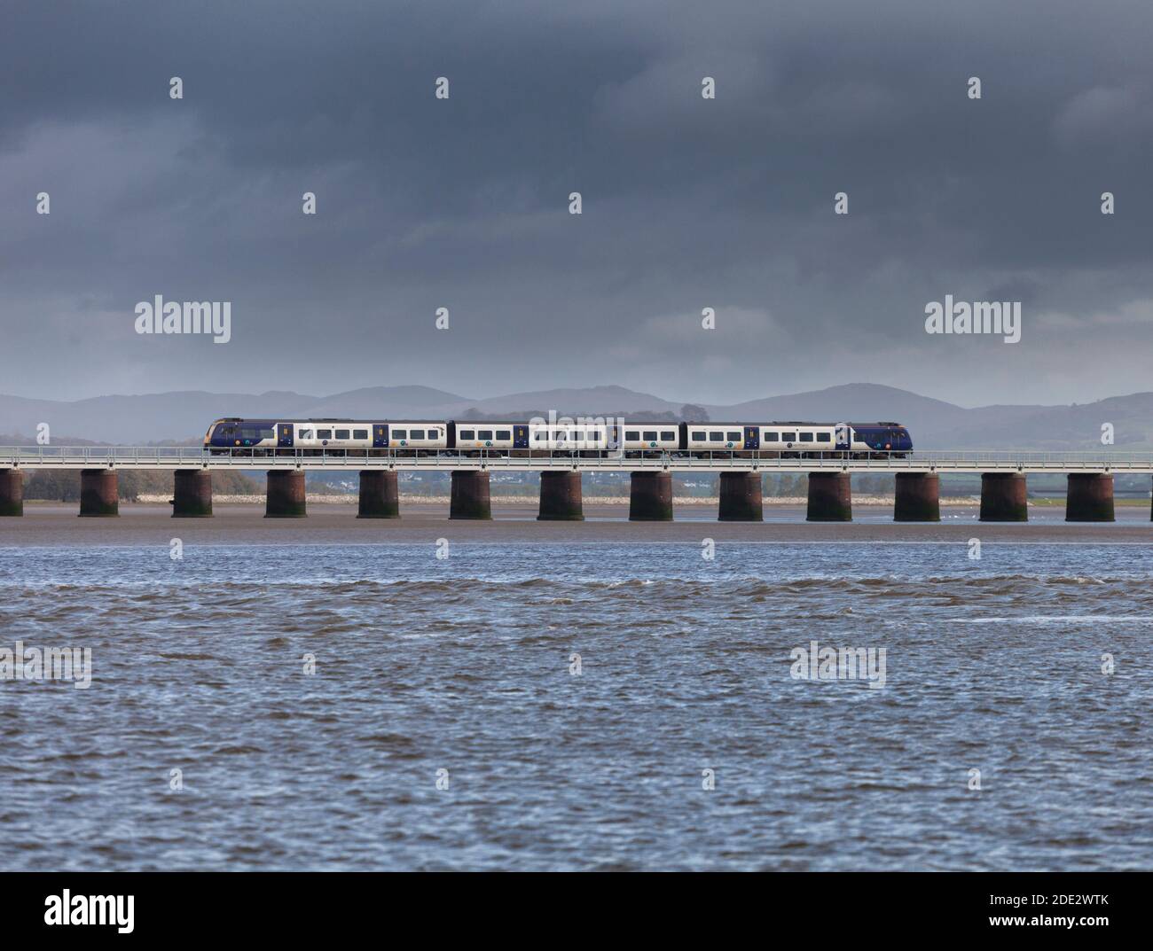Northern rail class CAF 195 train crossing Arnside viaduct across the ...