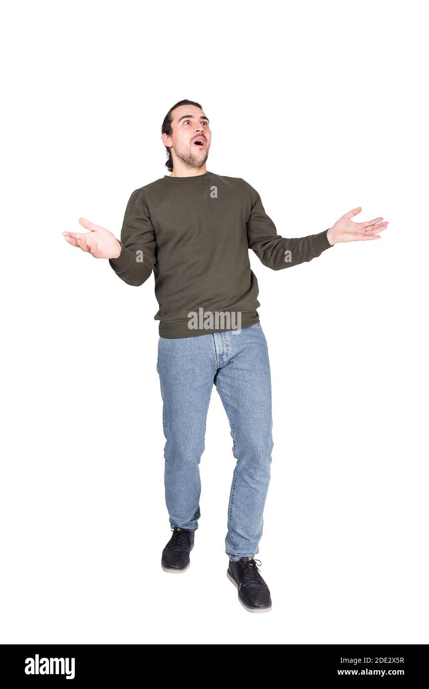 Full length portrait of excited casual young man keeps arms ...