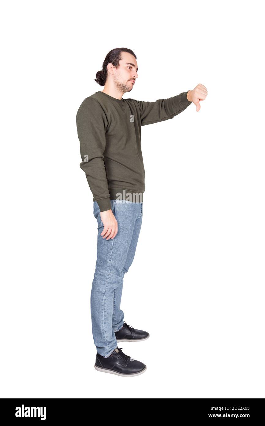 Side view full length portrait of displeased young man showing thumb ...