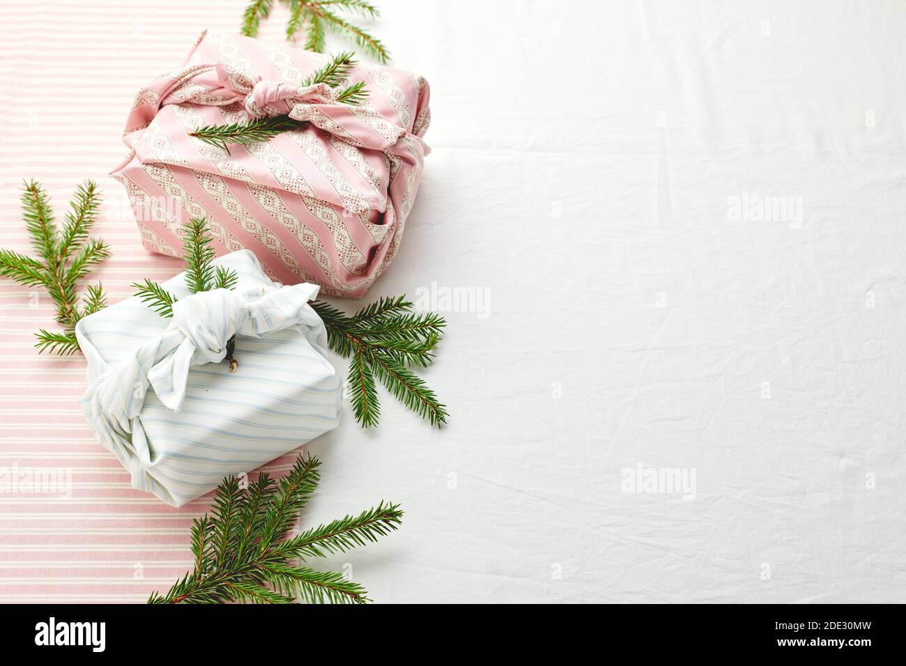 Christmas eco-friendly gift wrap in traditional japanese furoshiki ...