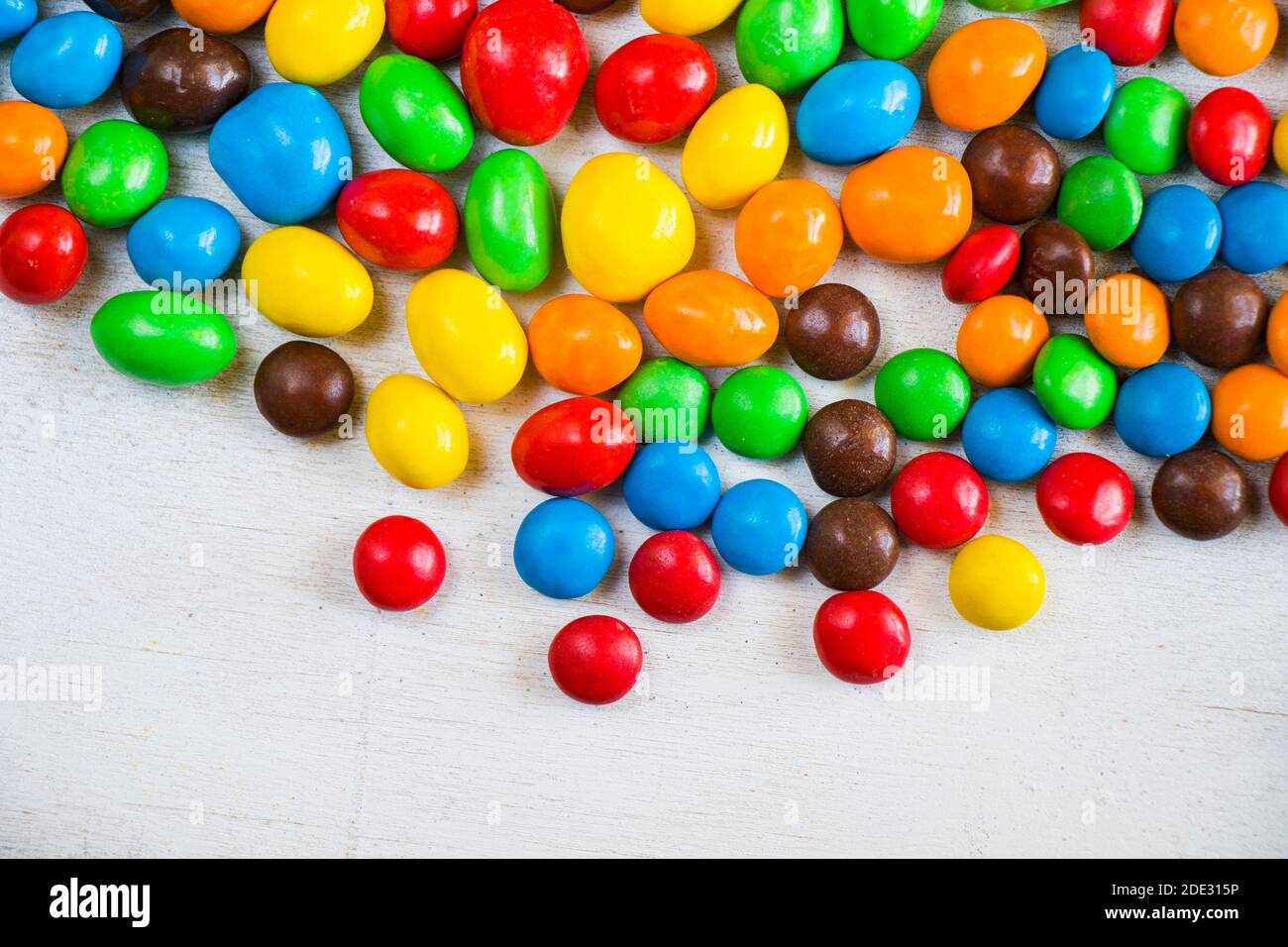 M&M's candy on the white background, colorful candy texture ...