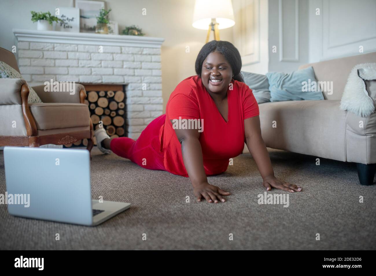 Plus size woman standing in hi-res stock photography and images - Alamy