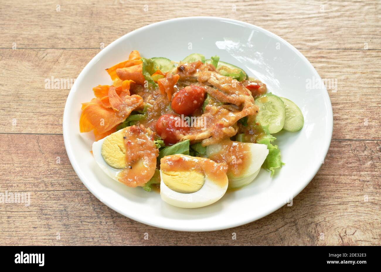 Islamic salad vegetable and boiled egg topping crispy fried taro ...