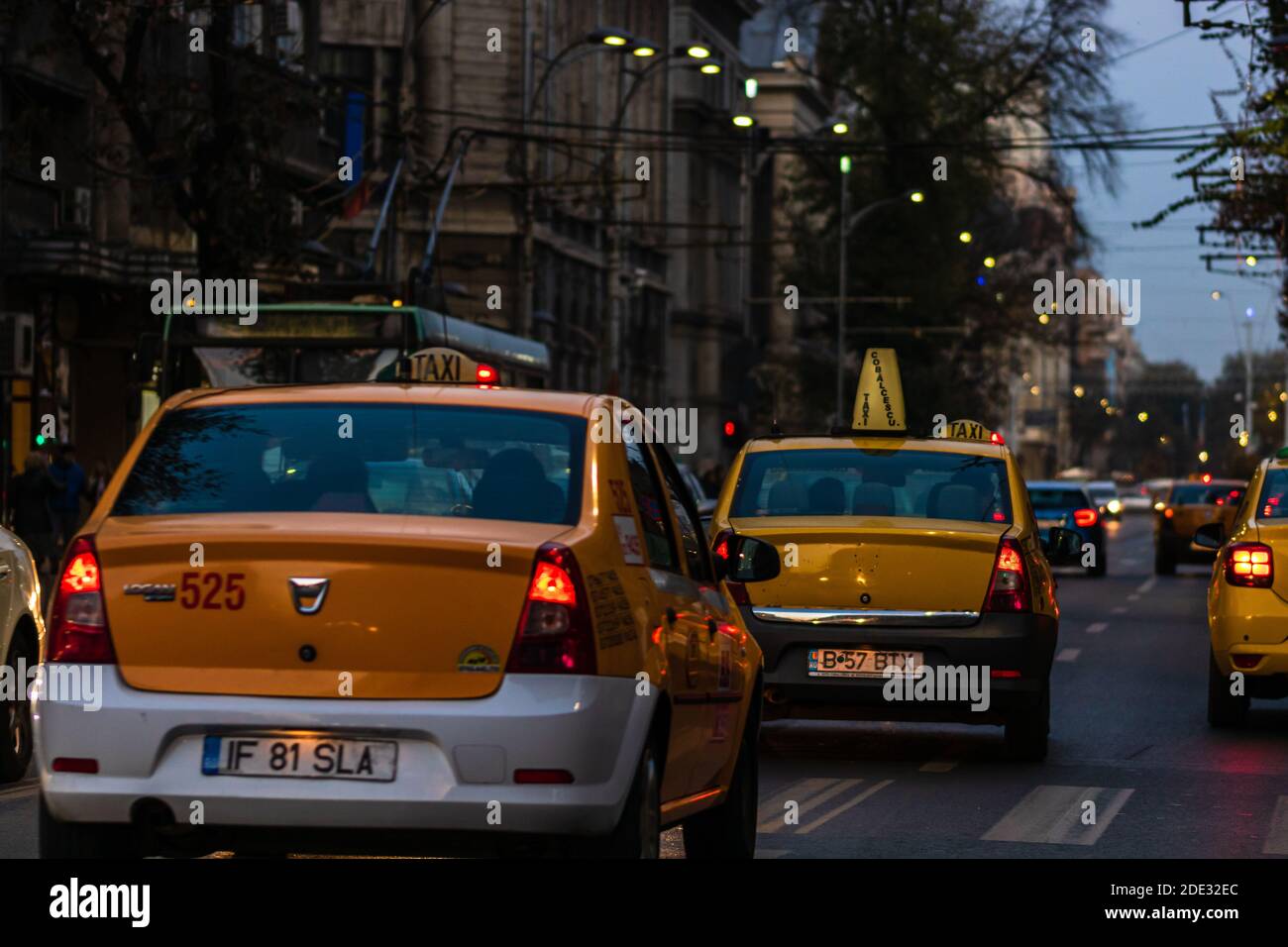 Car in traffic, modern city taxi service. Taxi cars parked at the taxi ...