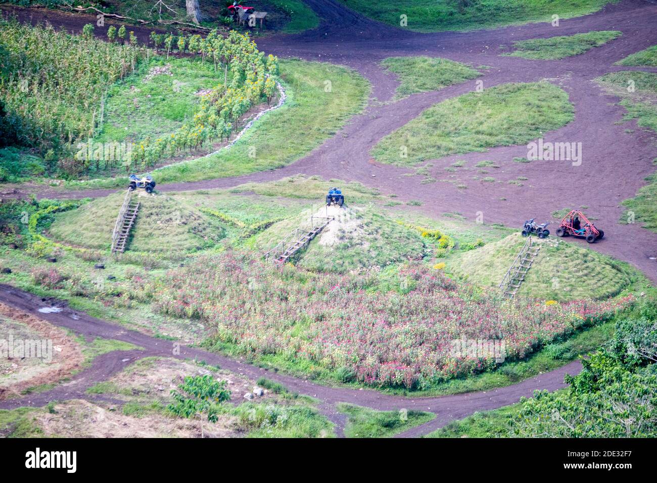 Tourists riding ATVs near the Chocolate Hills in Bohol, Philippines ...