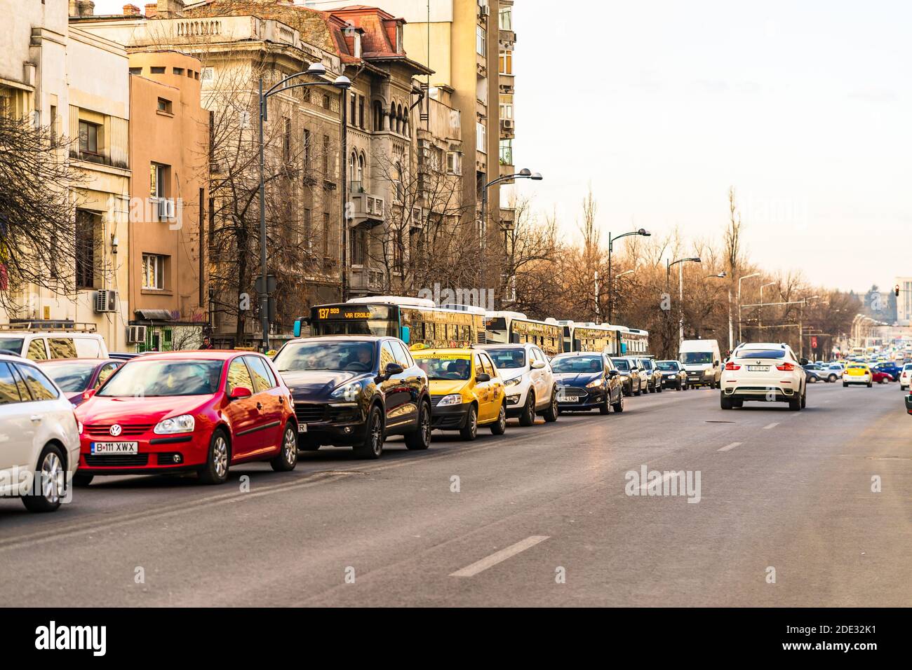 Car traffic at rush hour in downtown area of the city. Car pollution ...
