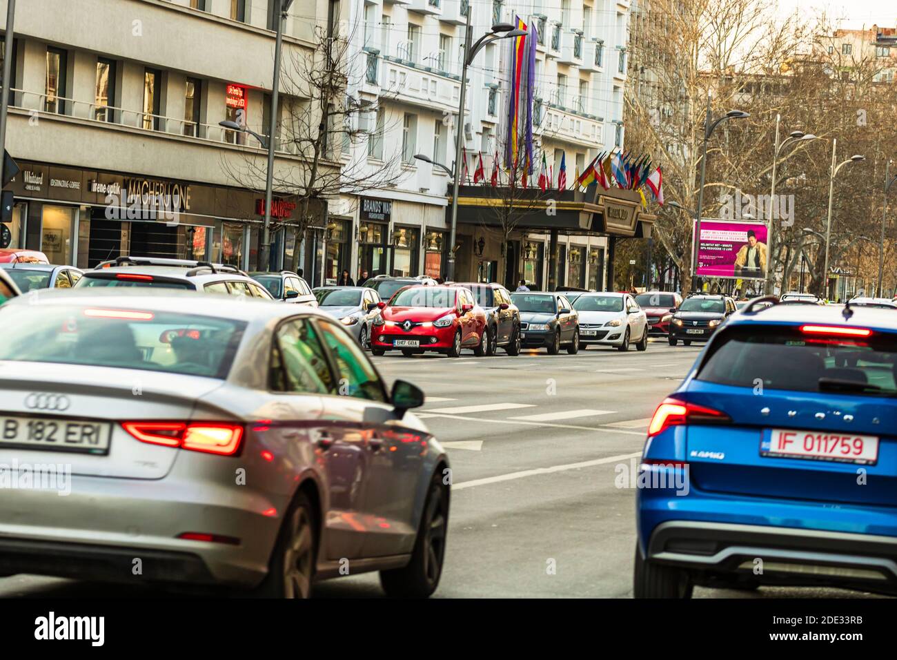 Car traffic at rush hour in downtown area of the city. Car pollution ...