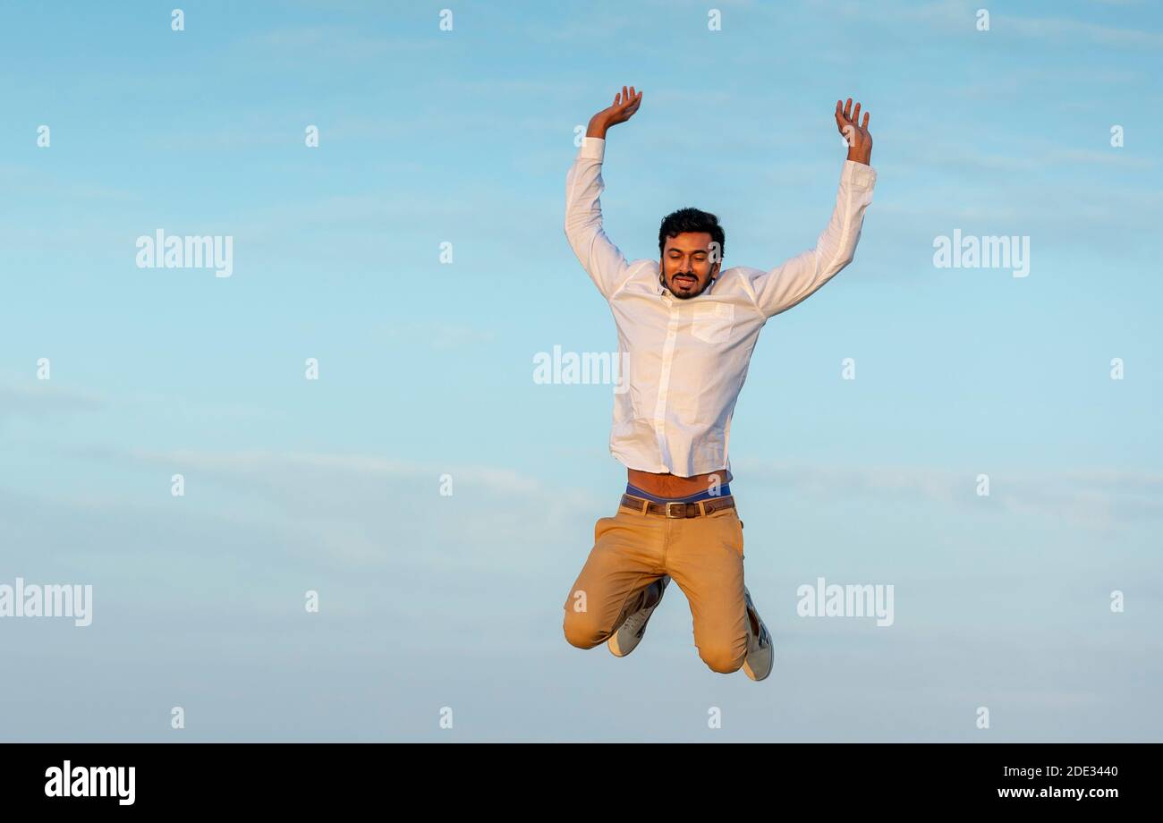 Man falling from a sky Stock Photo - Alamy