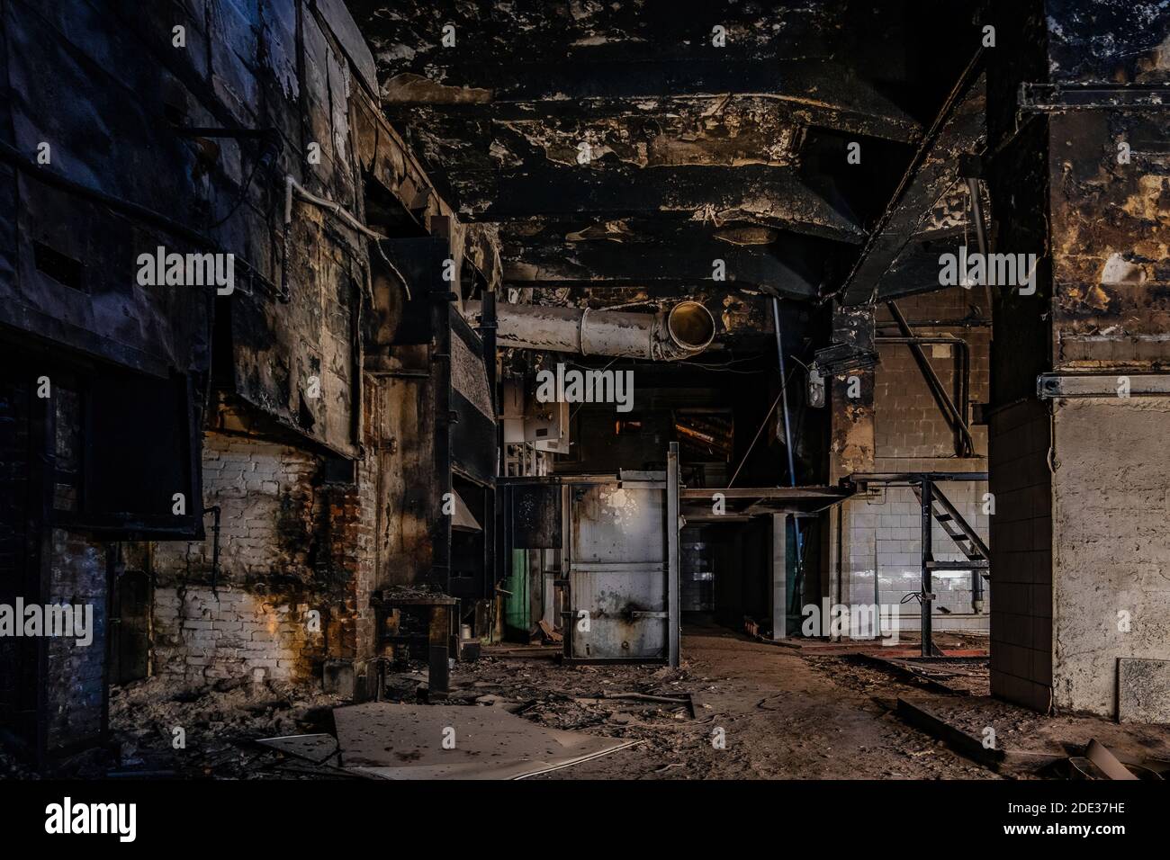 Burnt and ruined interior of industrial building after fire ...
