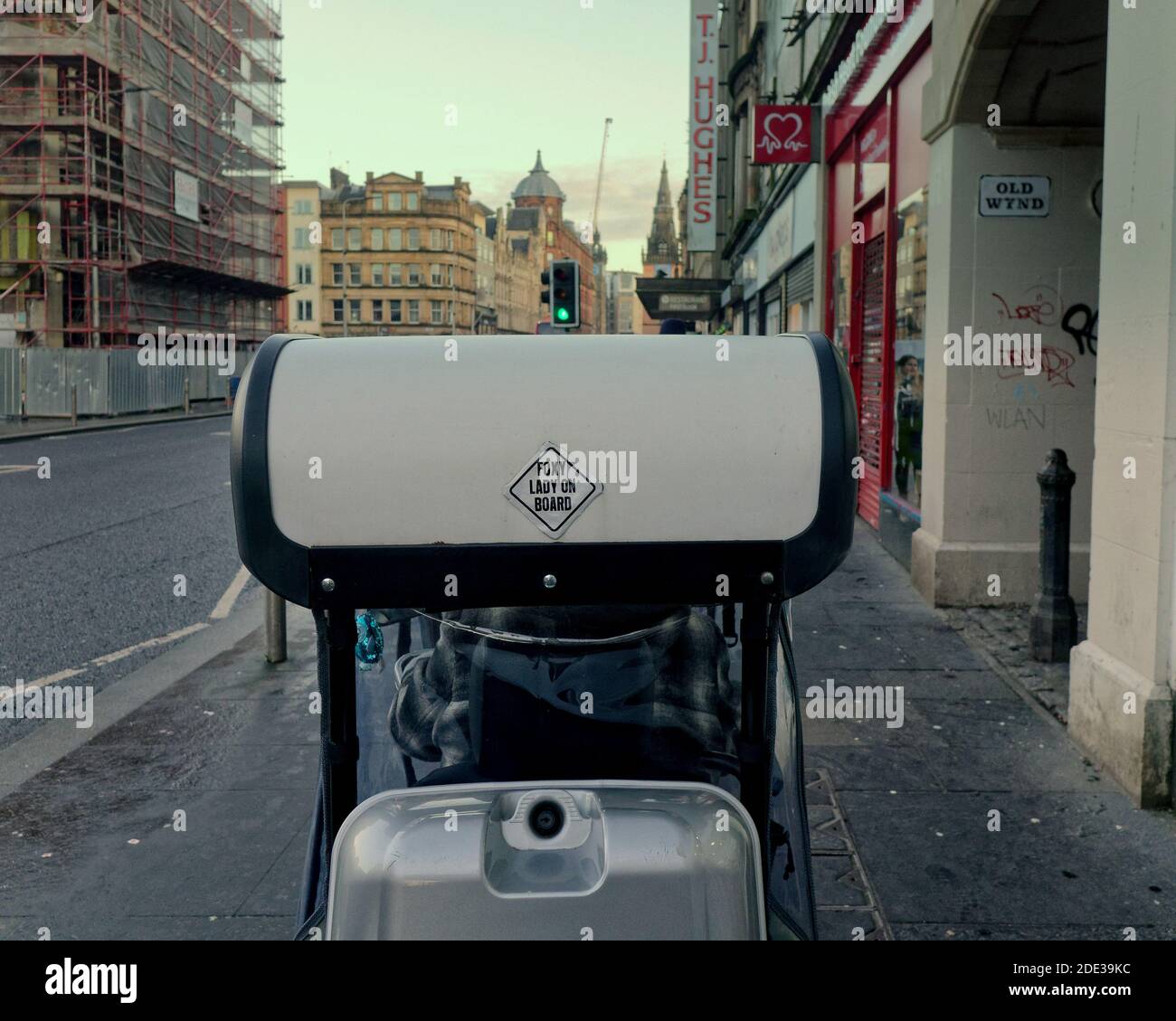 Glasgow, Scotland, UK, 28th November, 2020 An invalid carriafe hogs the ...