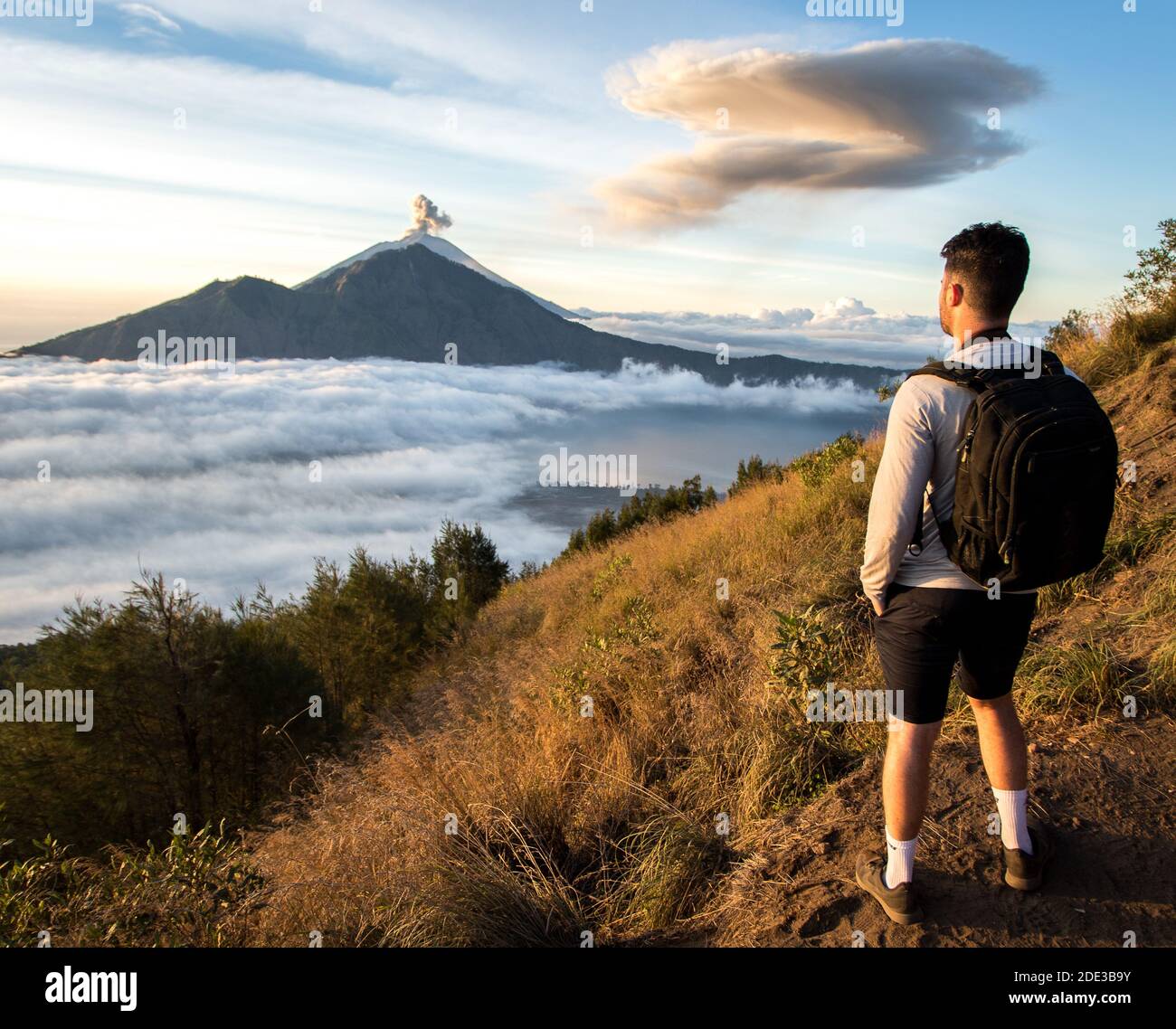 Volcano eruption at sunrise. Mount Agung, Bali, Indonesia Stock Photo ...
