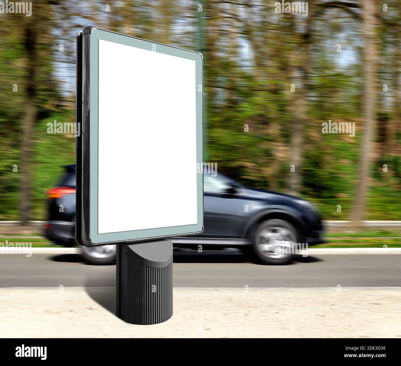 Vertical Urban signboard against car in movement in Forest road Stock ...