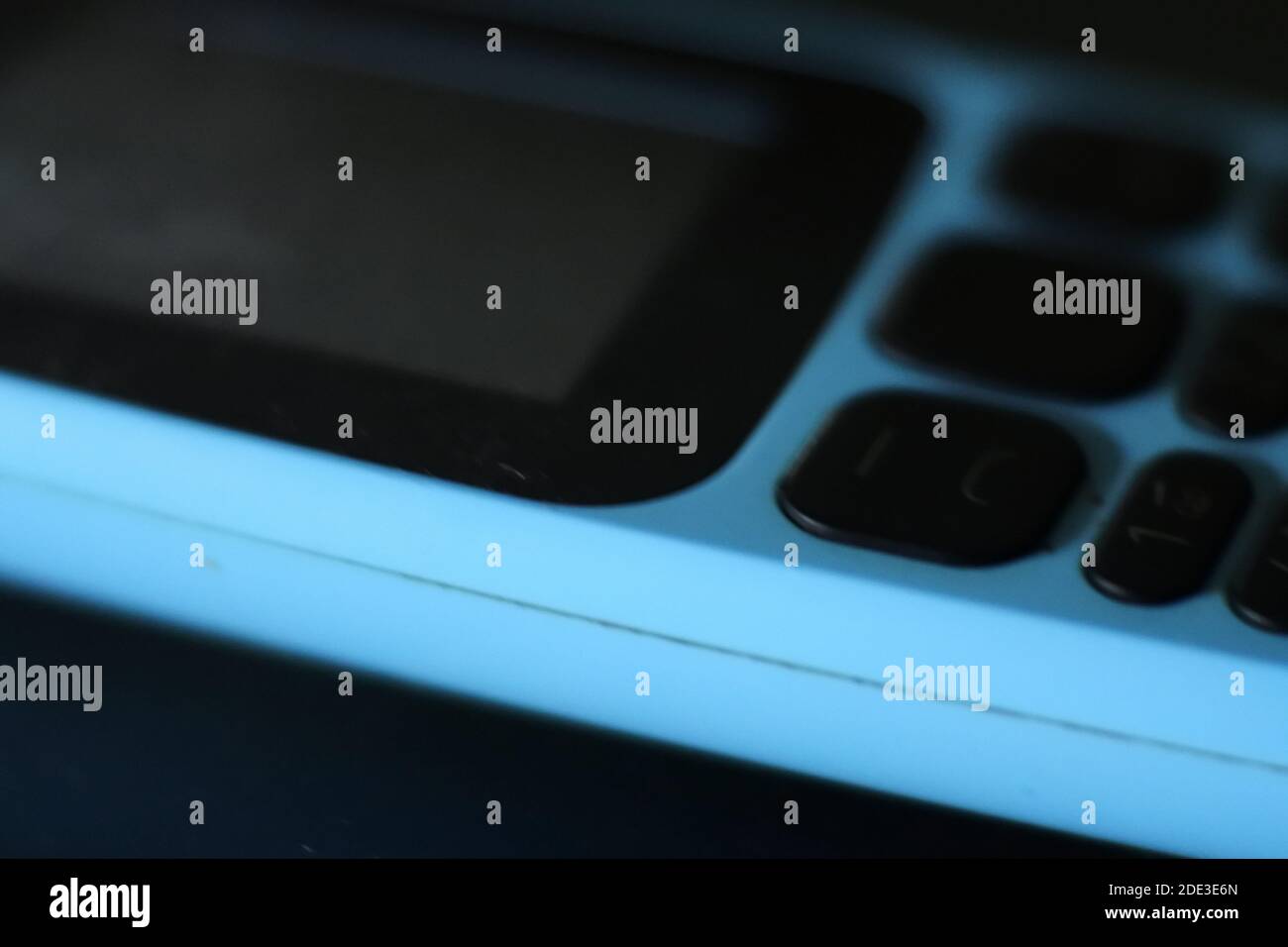 the blue push-button mobile phone with black buttons Stock Photo - Alamy