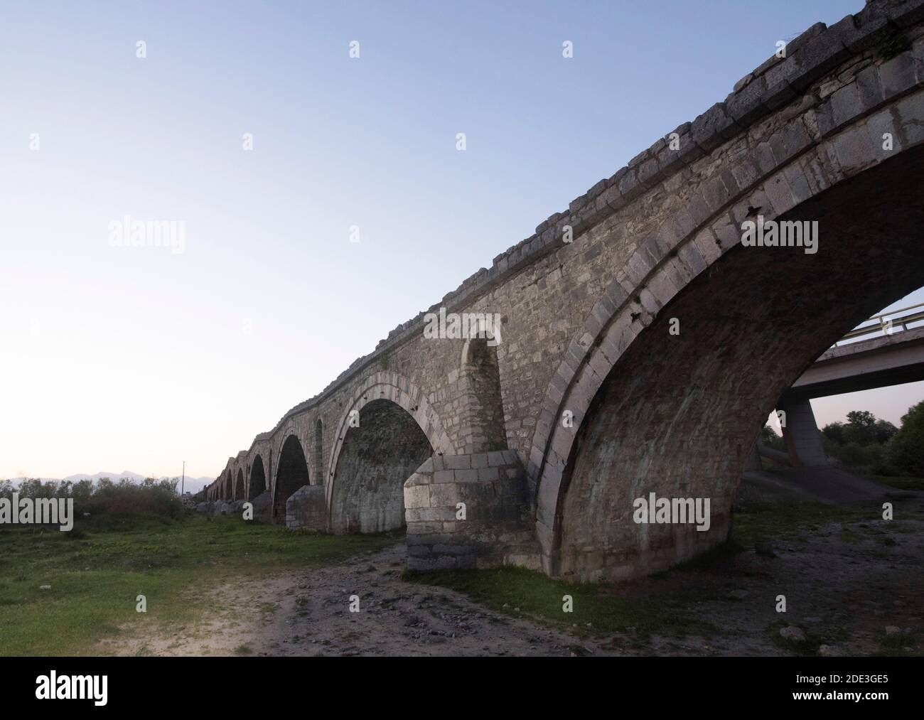 a stone bridge as a structure that crosses natural obstacles for ...