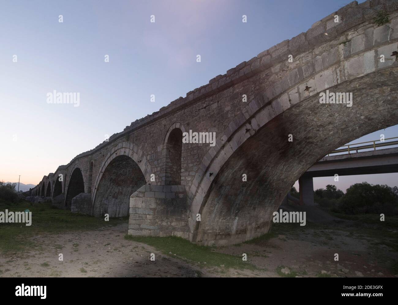 a stone bridge as a structure that crosses natural obstacles for ...