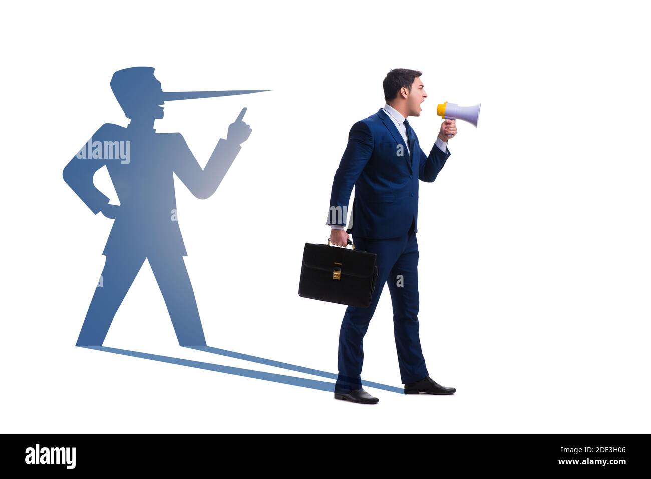 Concept of the businessman liar with his shadow Stock Photo - Alamy