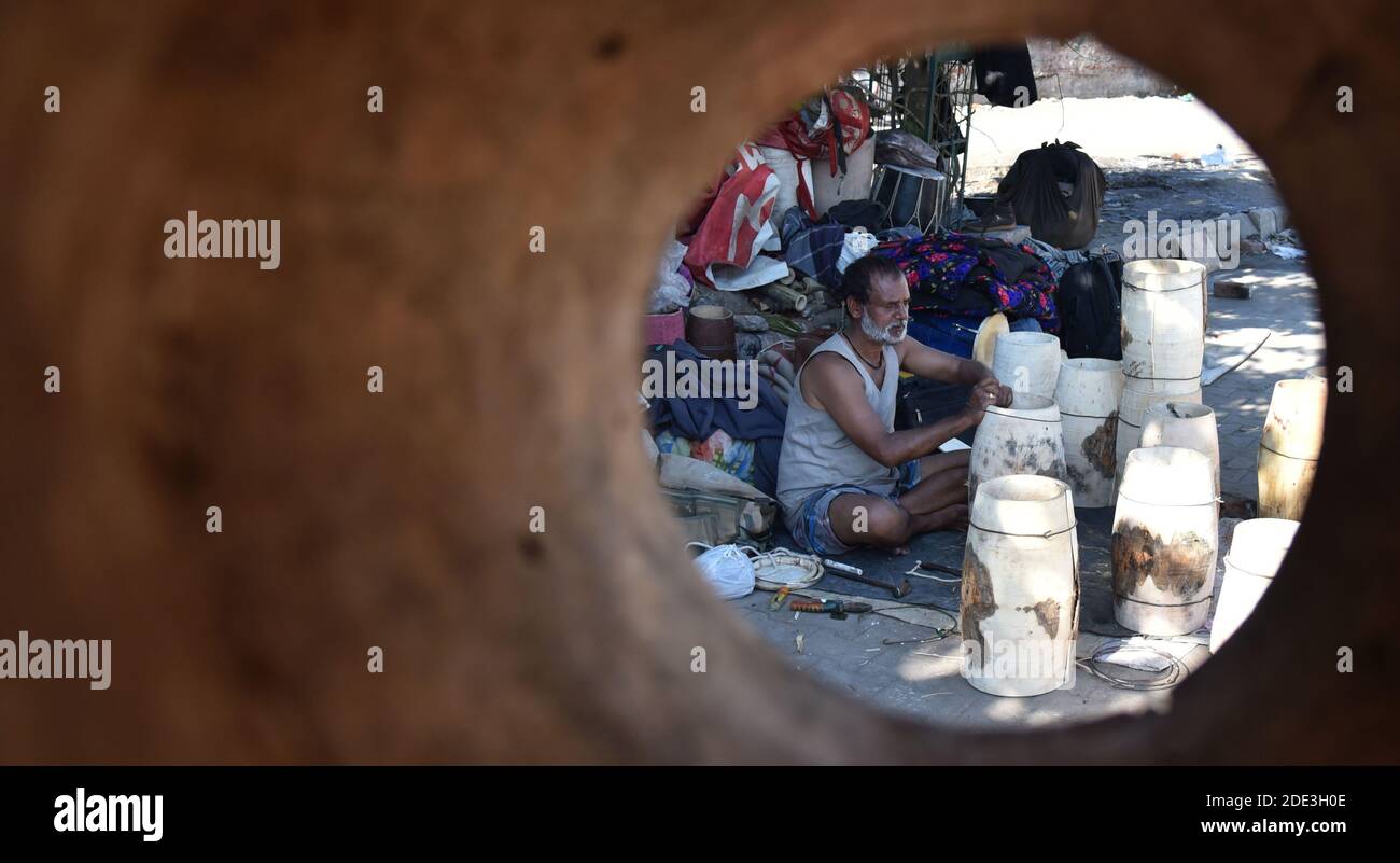 Jammu, Indian-controlled Kashmir. 27th Nov, 2020. A man makes ...