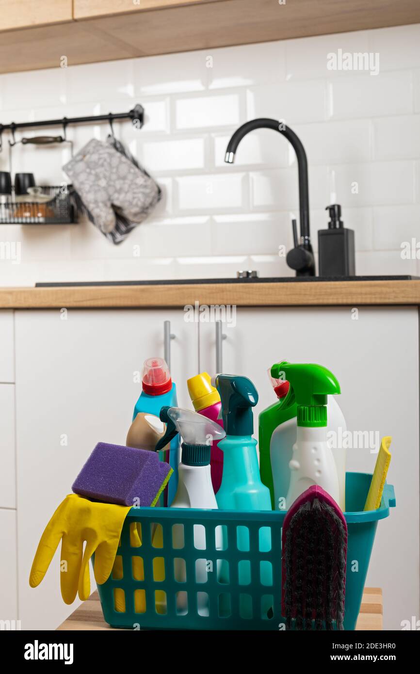 Colorful cleaning products in the kitchen Stock Photo - Alamy