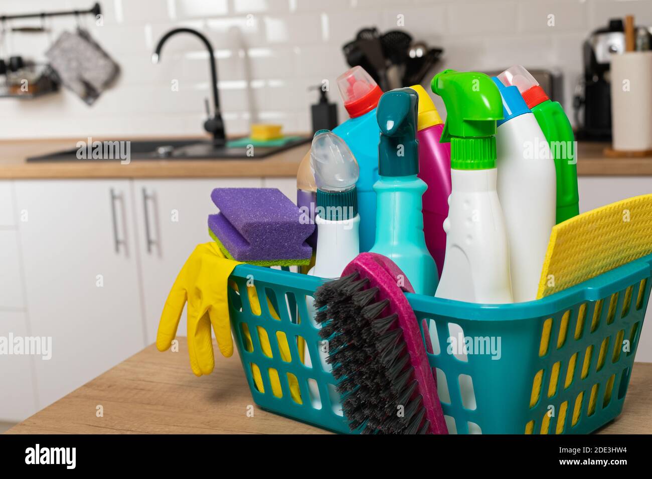 Colorful cleaning products in the kitchen Stock Photo - Alamy