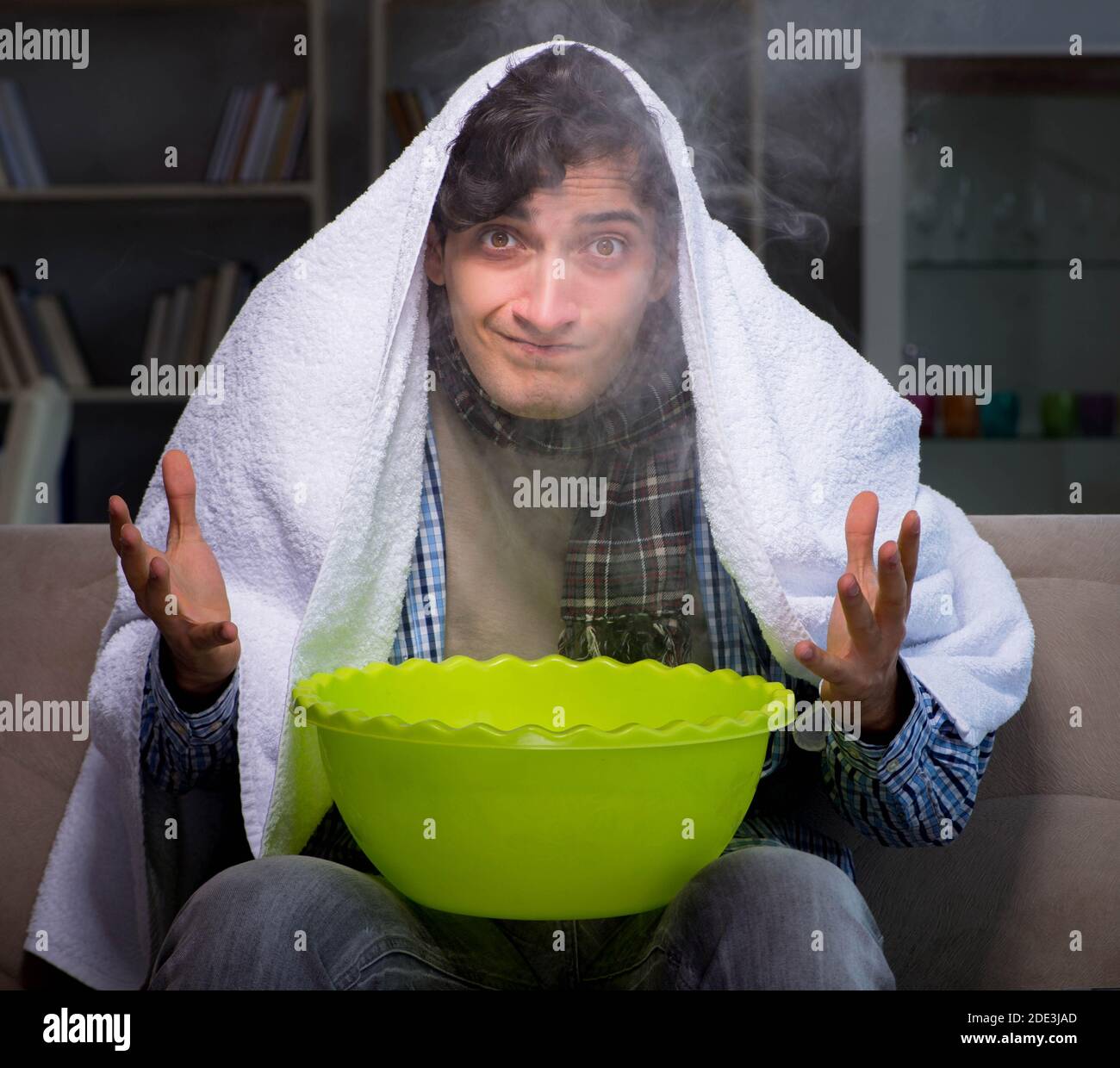The sick man doing inhalation at night in home Stock Photo - Alamy