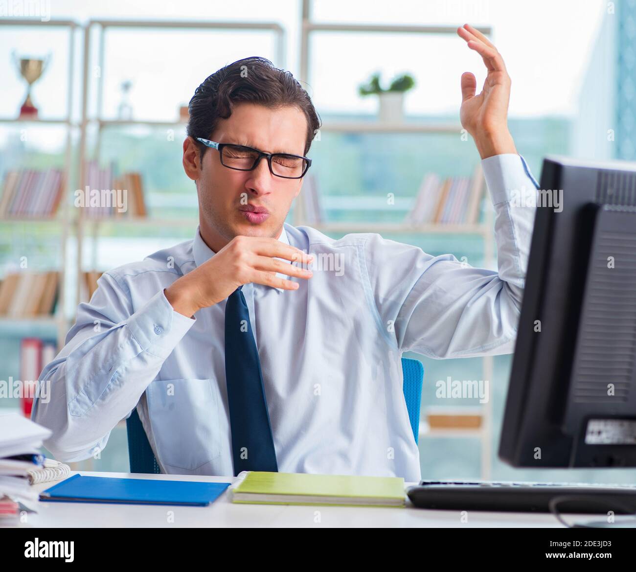 The businessman suffering from excessive armpit sweating Stock Photo ...