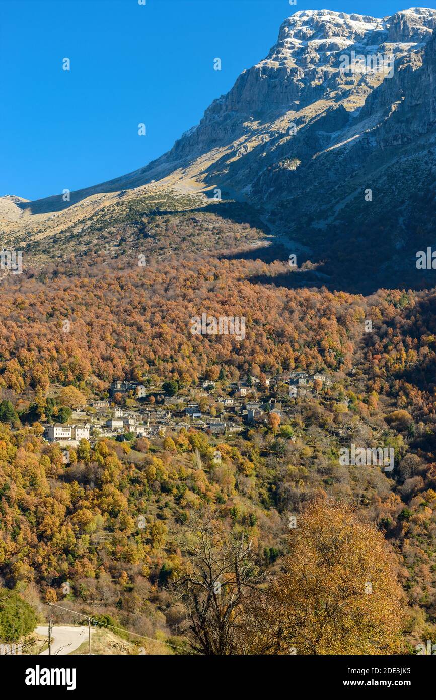 View of the traditional village Mikro Papigo with with stone buildings ...