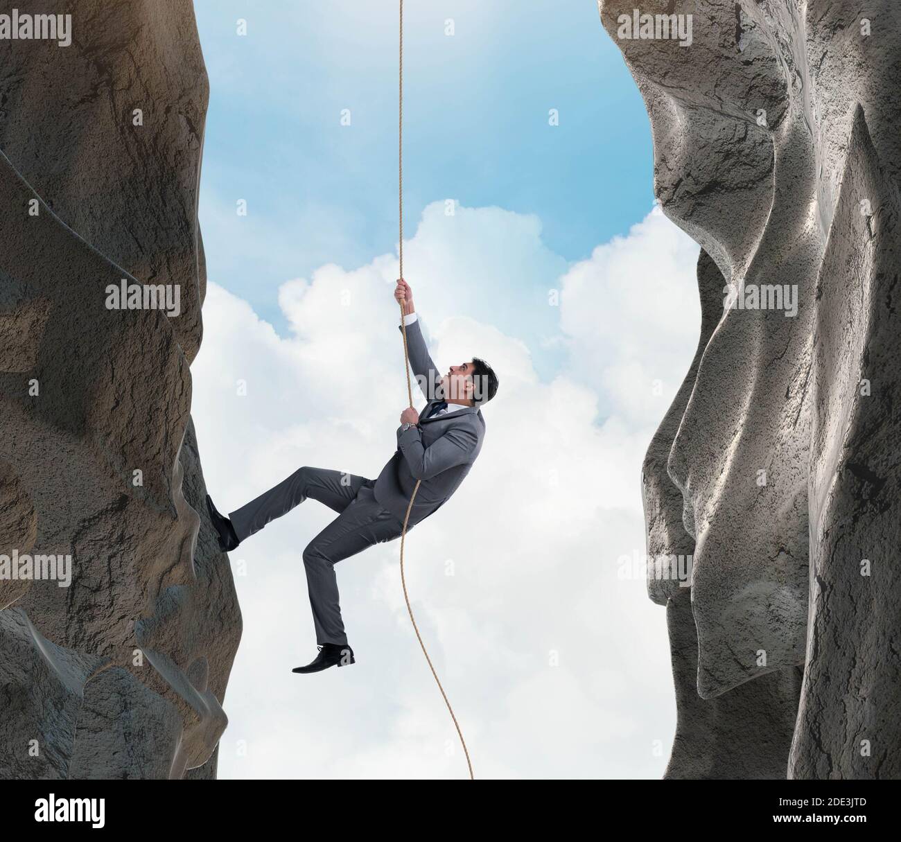 The businessman overcoming challenges in business concept Stock Photo ...
