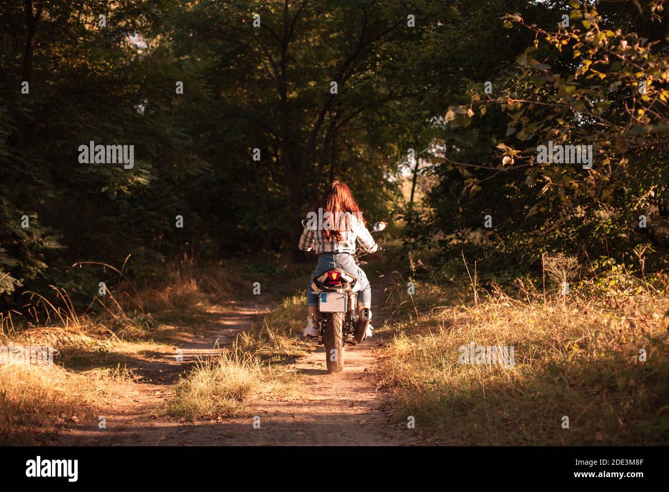 Woman riding on back motorcycle hi-res stock photography and images - Alamy