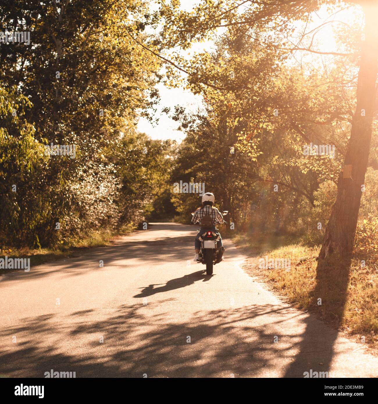 Woman riding on back motorcycle hi-res stock photography and images - Alamy