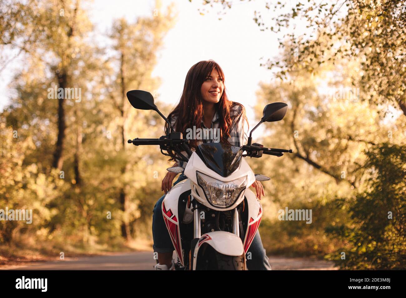 Biker Riding Motorcycle Low Angle High Resolution Stock Photography and ...