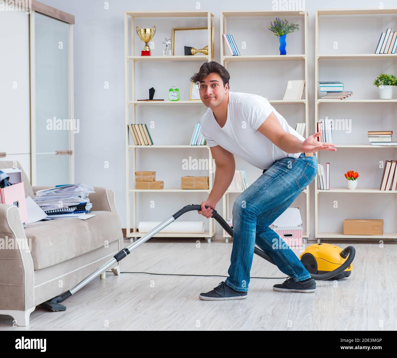 The man doing cleaning at home Stock Photo - Alamy