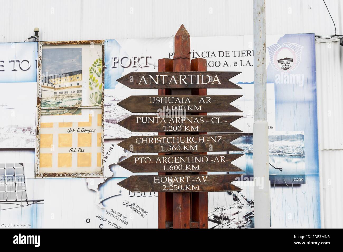 Wooden direction signs on a signpost, Ushuaia, Patagonia, Argentina ...