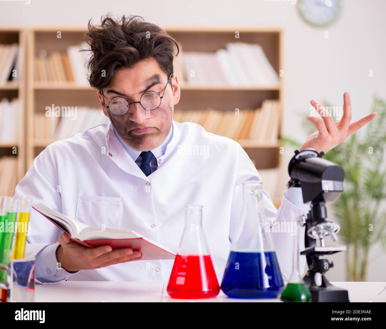 The mad crazy scientist doctor doing experiments in a laboratory Stock ...