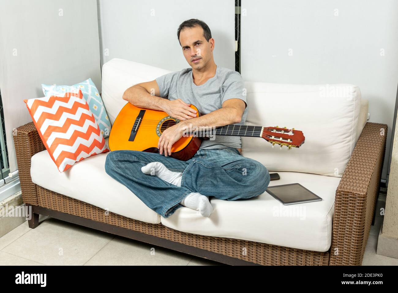 Hugging guitar hi-res stock photography and images - Alamy