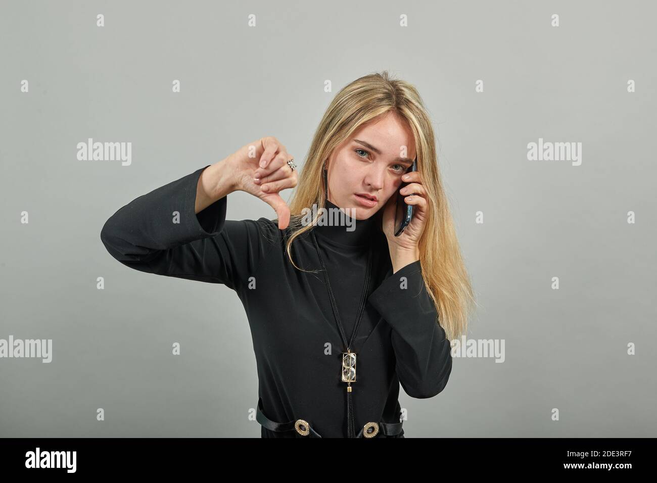 Human hand thumb down, no okay sign, angry face, negative gesture ...