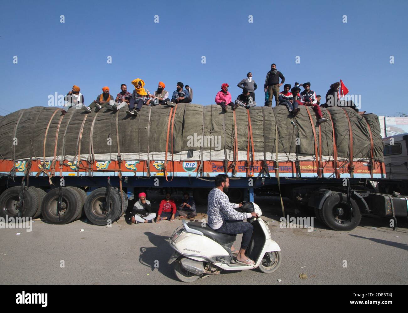 Farmers sitting on top of a truck during the demonstration.For two days ...