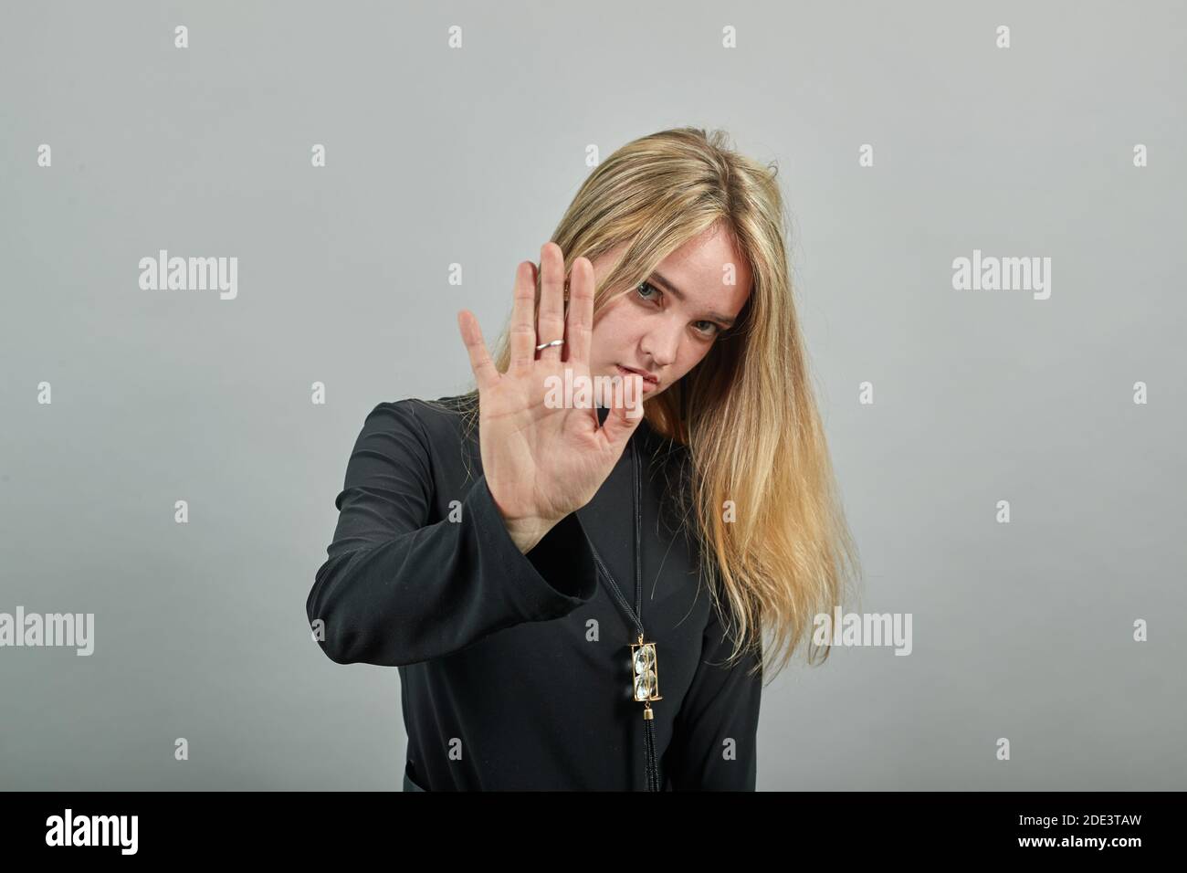 Palm arm raised air angry look straight you will not pass through ...