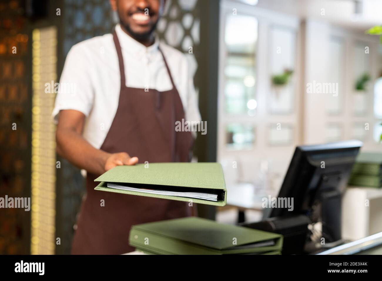 Happy waiter hi-res stock photography and images - Alamy