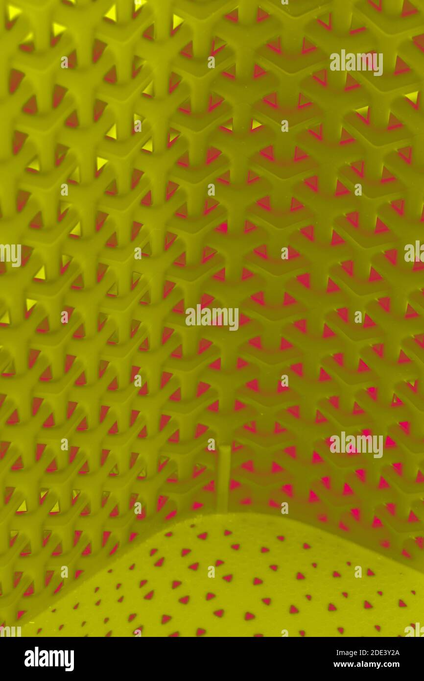 Multidimensional interwoven background pattern in yellow, and orange ...