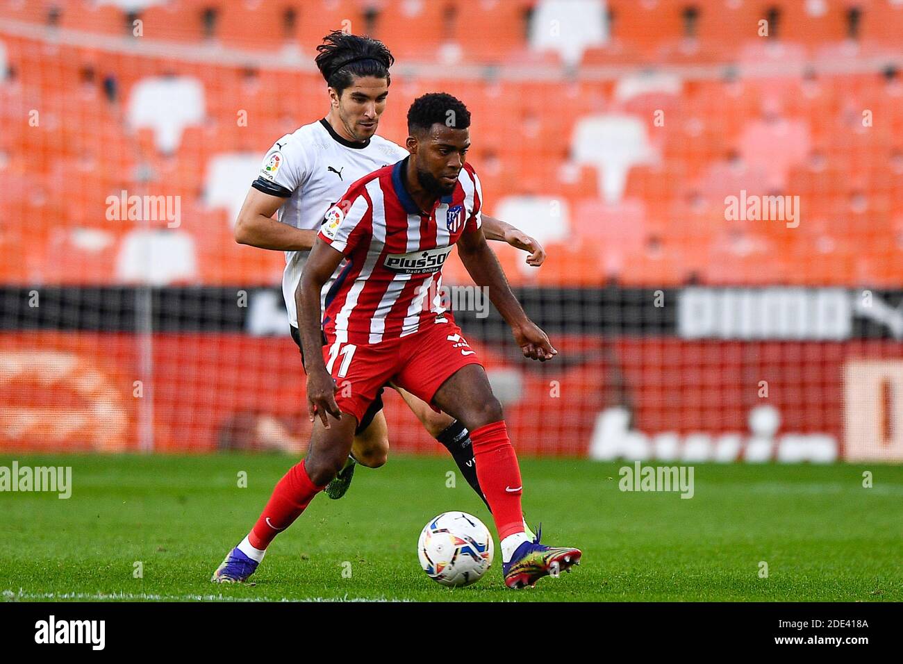VALENCIA, SPAIN - NOVEMBER 28: Carlos Soler of Valencia CF, Thomas ...