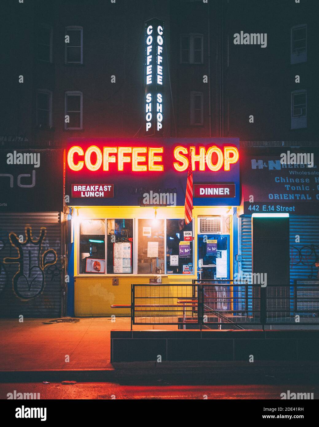 Coffee shop neon sign at night, on 14th Street in the East Village ...