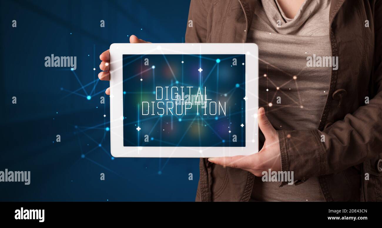 Young business person working on tablet and shows the digital sign ...
